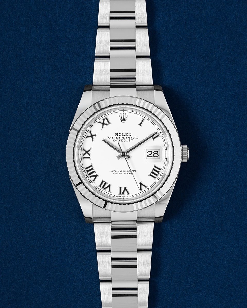 Rolex vs Omega: What the Market Actually Says | 2026 Comparison | Loupe